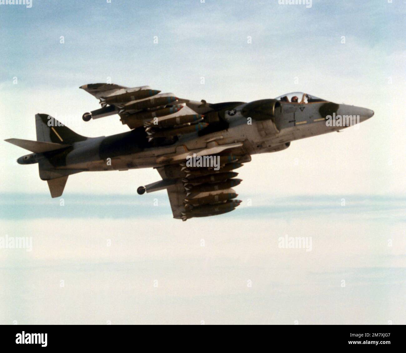 Air-to-air right underside view of a U.S. Marine Corps AV-8B Harrier II ...