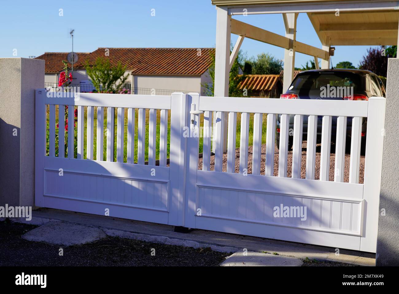 white street home door pvc plastic gate slats portal of suburb house ...