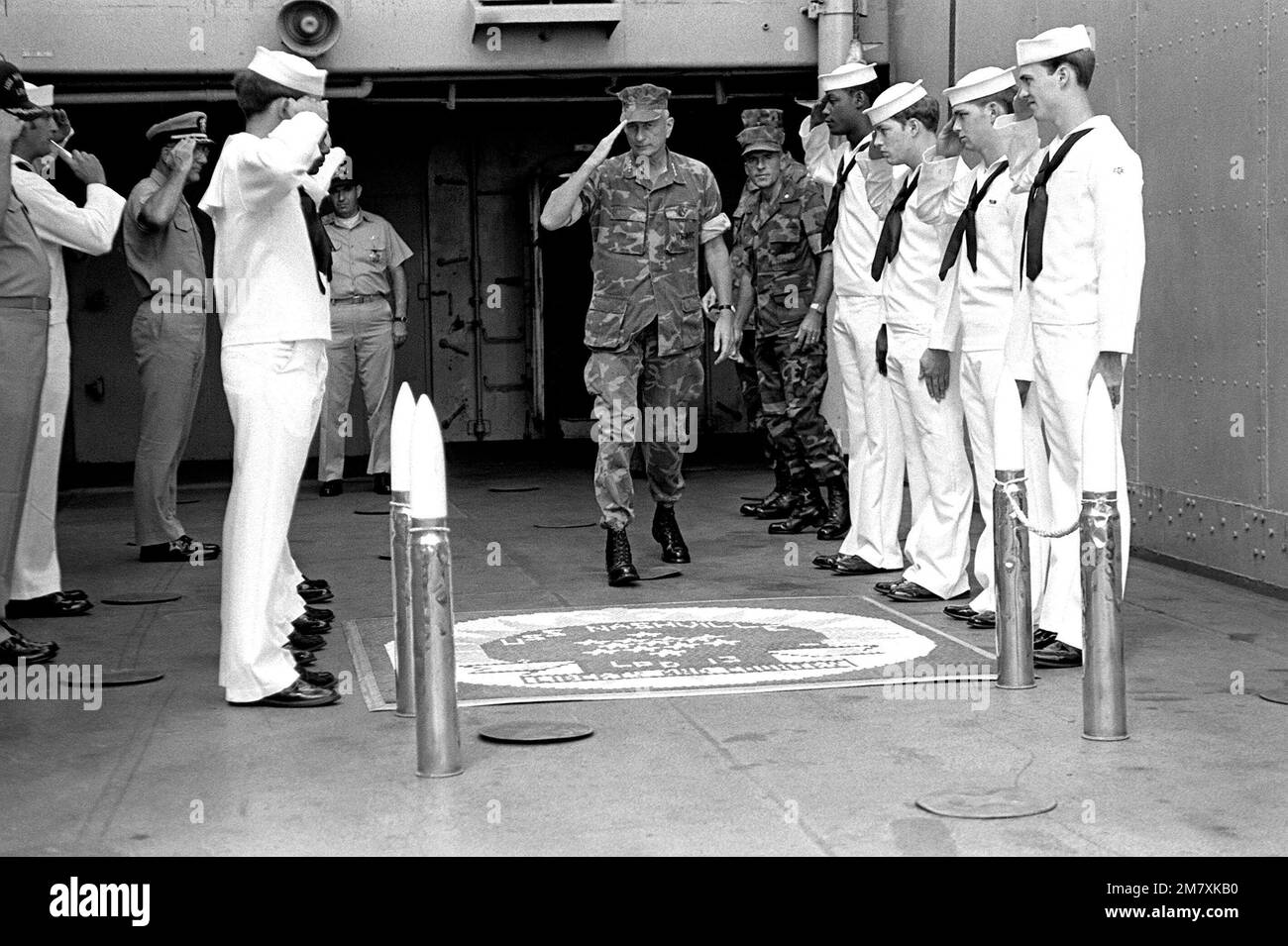 General Robert H. Barrow, Commandant of the Marine Corps, prepares to ...