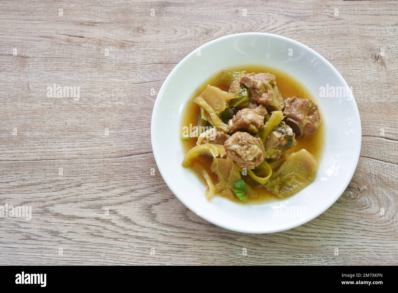 boiled pork bone with pickled cabbage stew on plate Stock Photo - Alamy