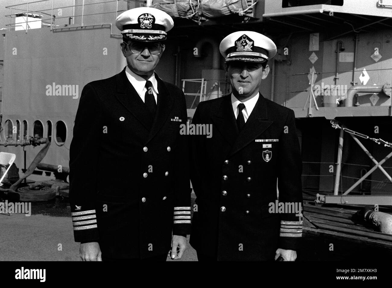 A US Navy officer and the Turkish Naval Attache to the United States ...