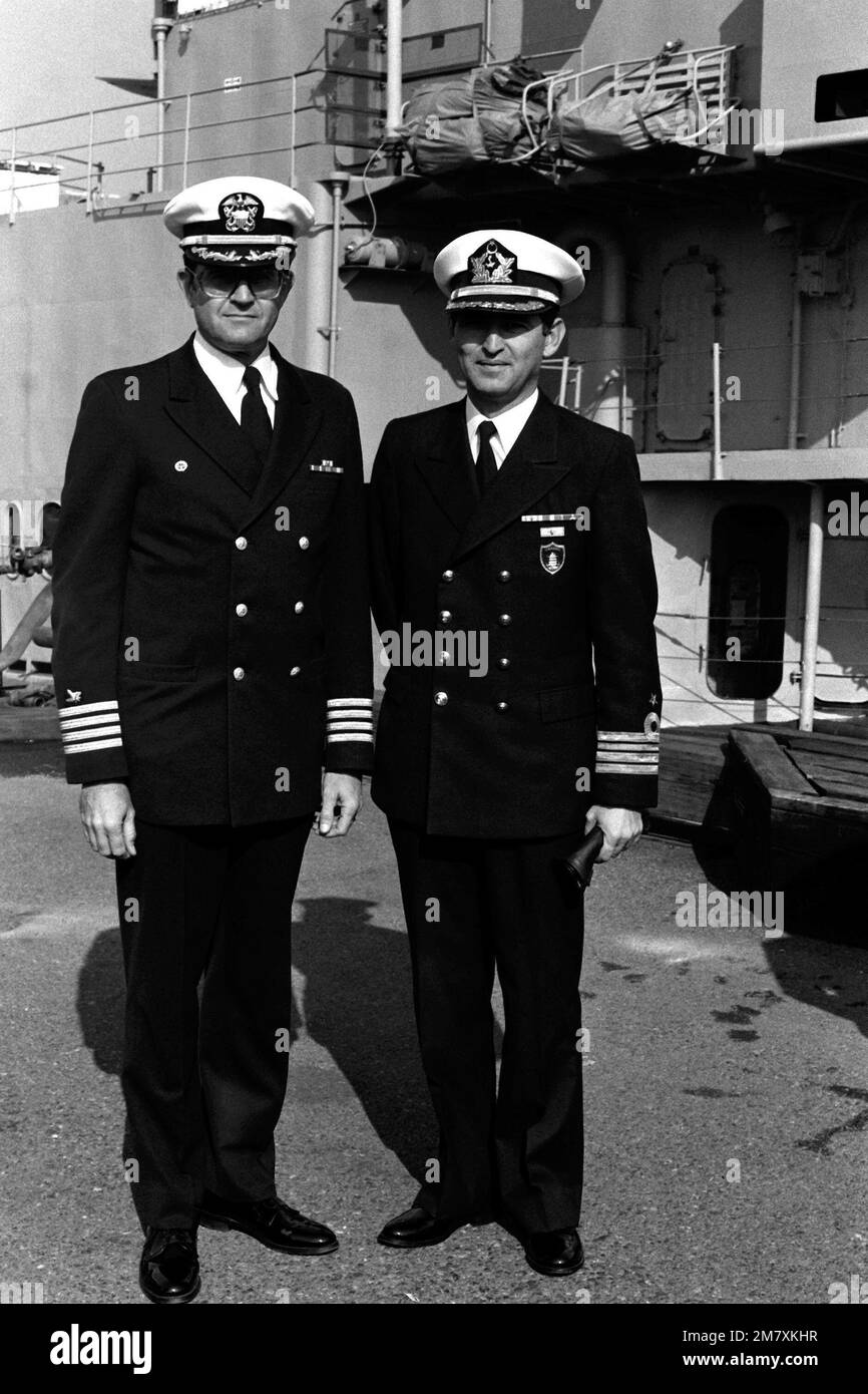 A US Navy officer and the Turkish Naval Attache to the United States ...