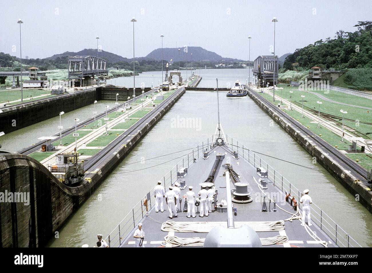 A view of the Pedro Miguel Locks from the forward deck of the destroyer ...
