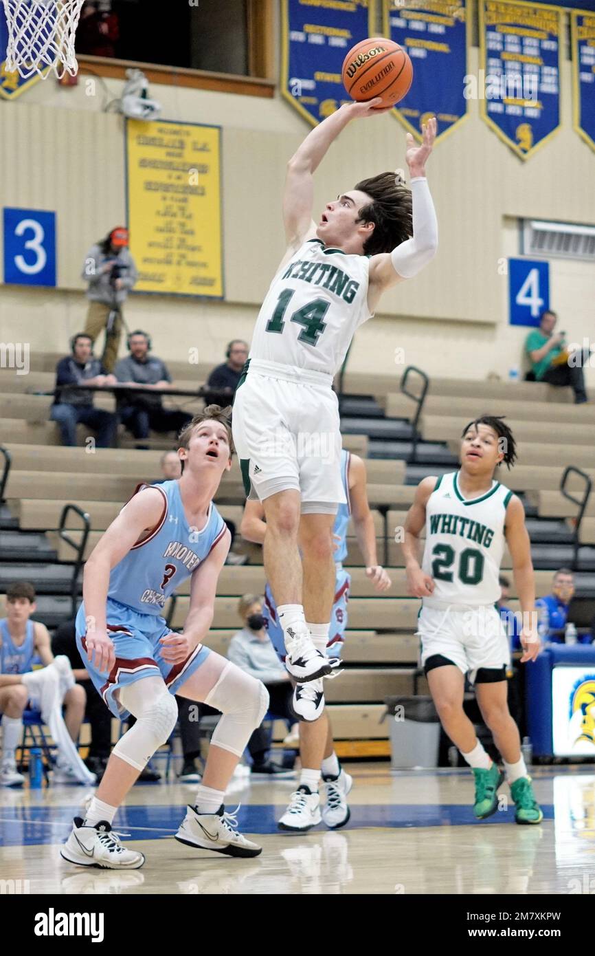 A young white basketball player shooting the ball Stock Photo - Alamy