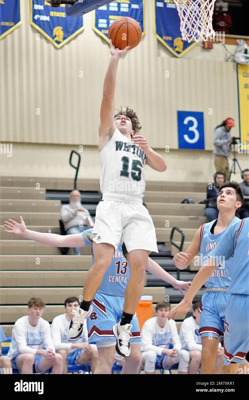 A young white basketball player shooting the ball Stock Photo - Alamy
