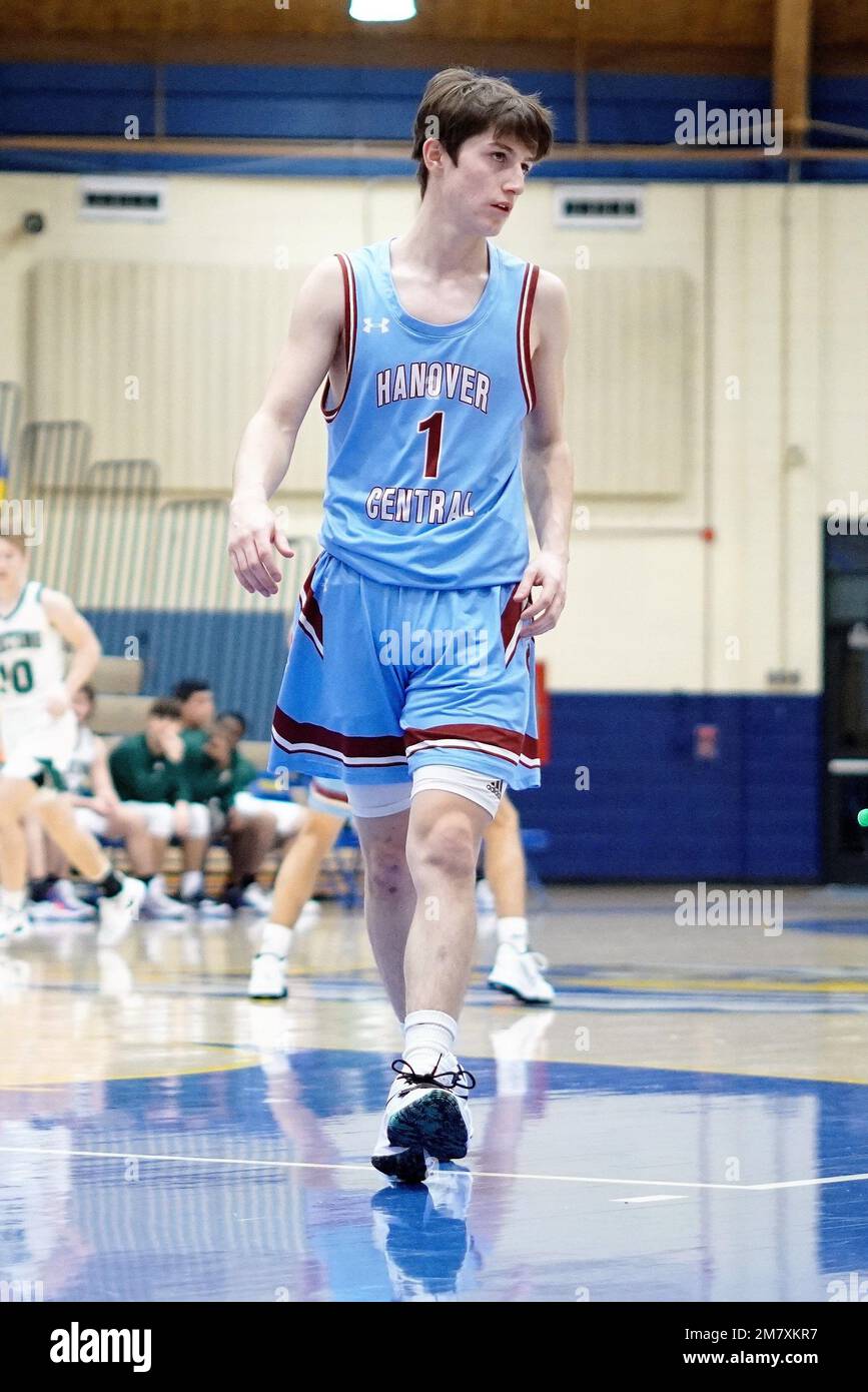 A young white basketball player walking in the court Stock Photo - Alamy