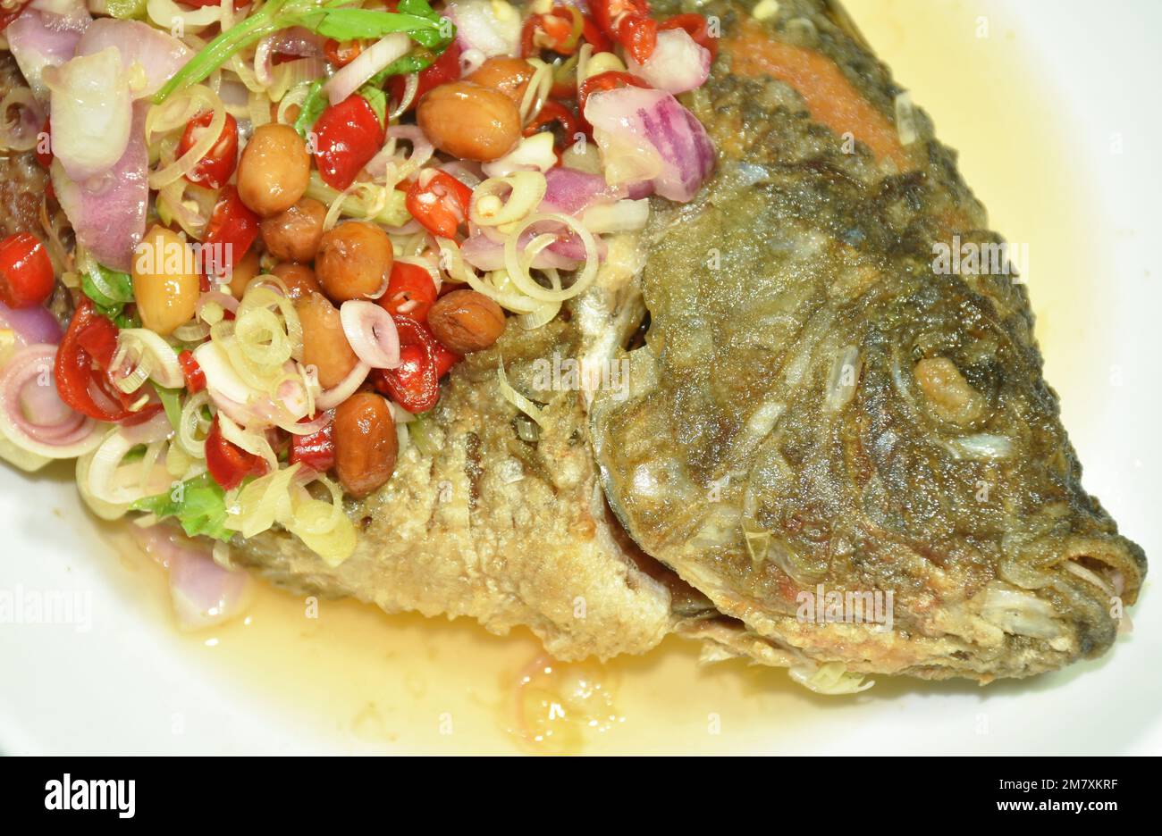 Spicy boiled tilapia mango hi-res stock photography and images - Alamy