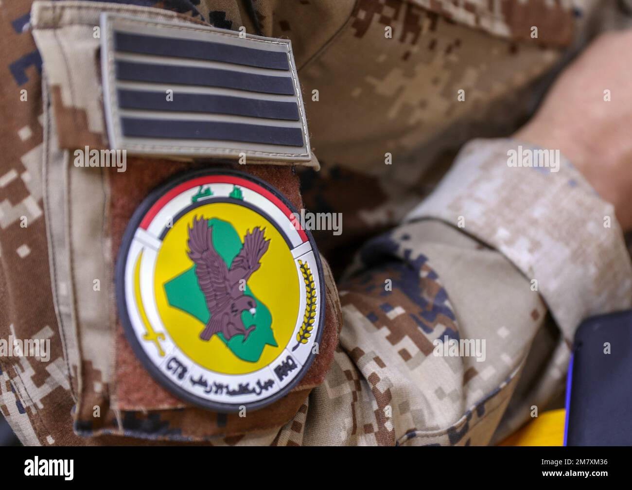 An Iraqi Counter Terrorism Service (ICTS) servicemember participates in ...