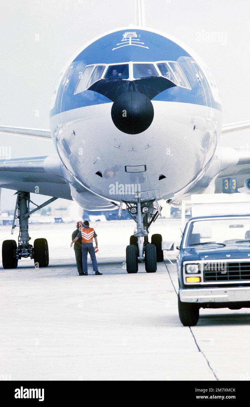 Front view of a KC-10 Extender aircraft as ground crewmen prepare for ...