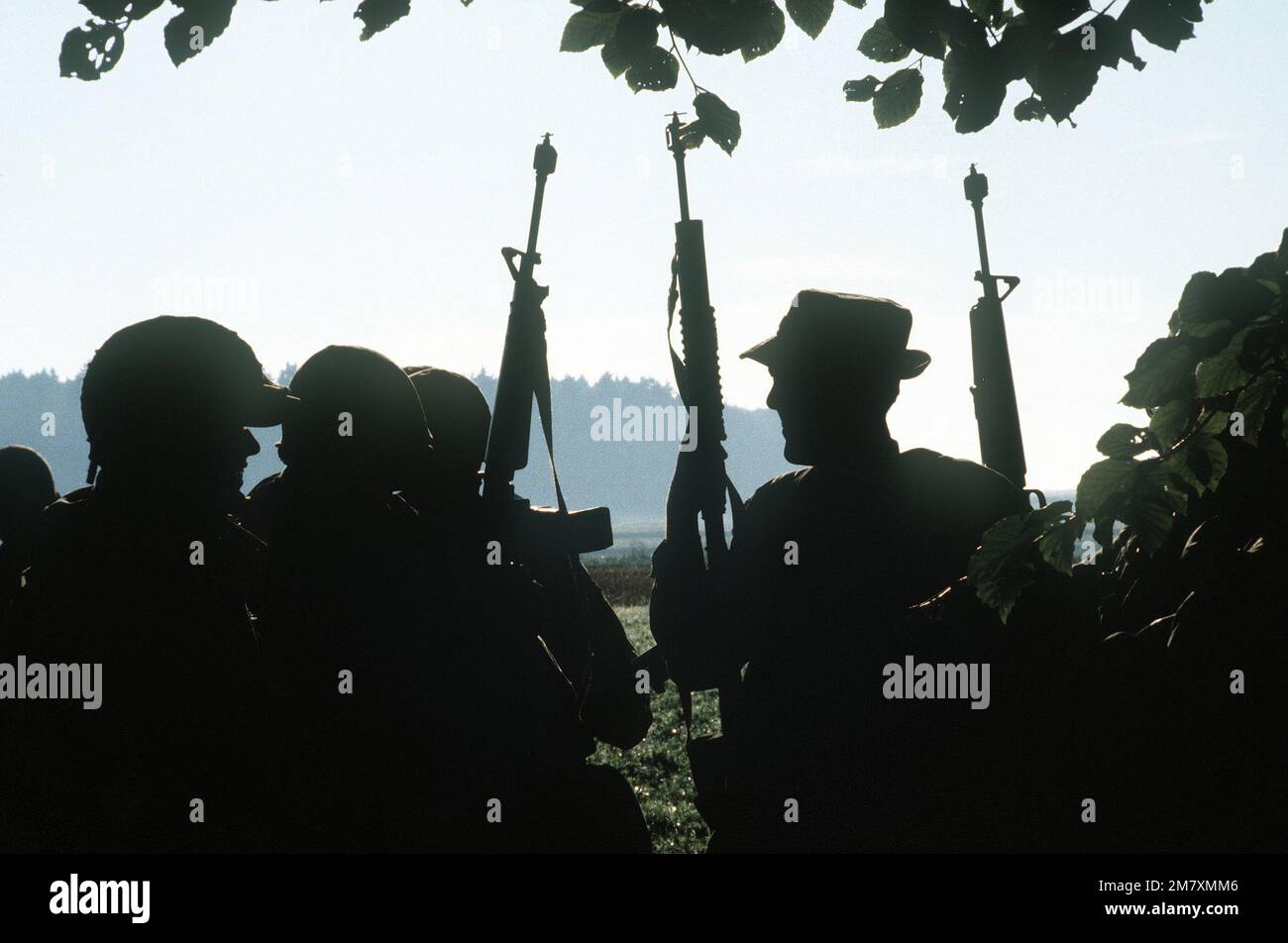 Armed with m 16 rifles hi-res stock photography and images - Alamy