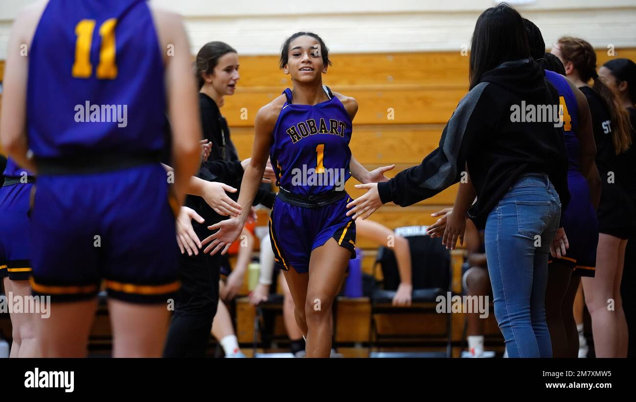 Woman Running Onto Basketball Court at Noah Ling blog