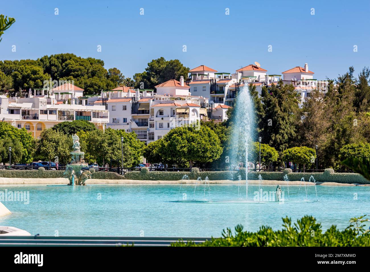 Sprinkling fountain in the park, sunny spring view from "Parque de la ...