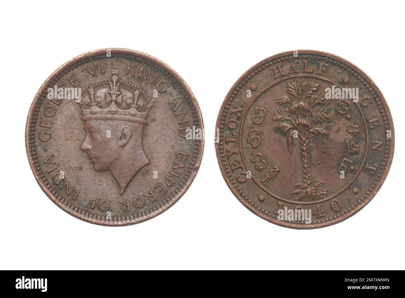 A closeup shot of a Sri Lankan or Ceylonian half-cent coin made in 1940 ...