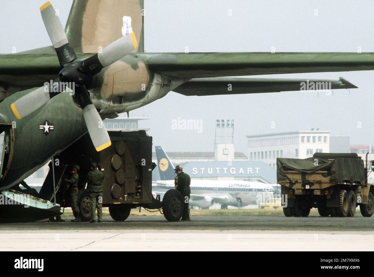 Equipment belonging to the 32nd Combat Mobility Hospital is loaded onto ...