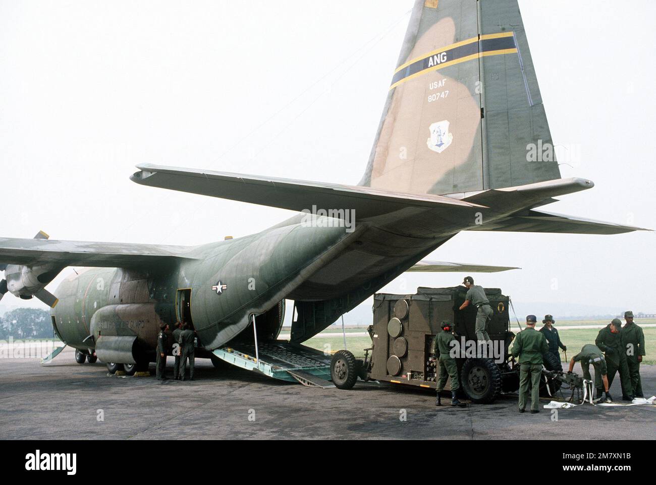 Equipment belonging to the 32nd Combat Mobility Hospital is loaded onto ...