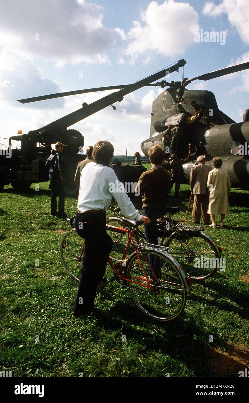 A CH-47 Chinook helicopter awaits last minute preparations before ...