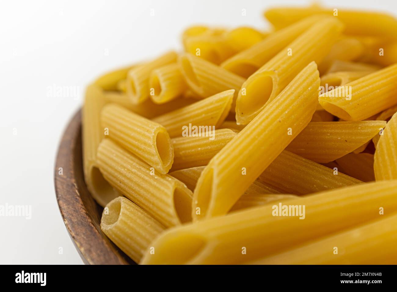 penne on a white background Stock Photo - Alamy