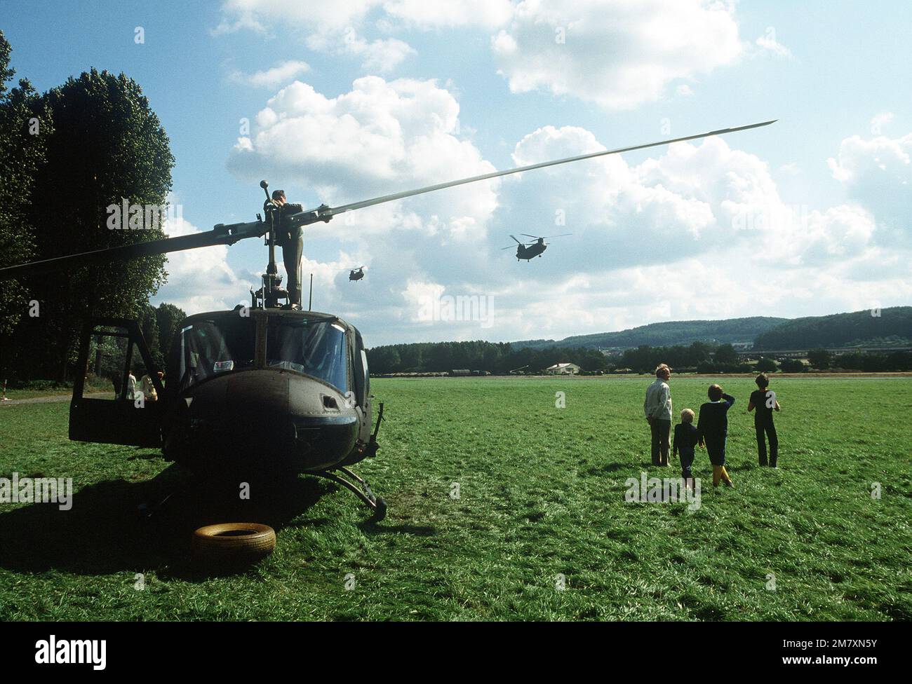 A UH-1N Iroquois helicopter is parked during Exercise Reforger '81. Two ...