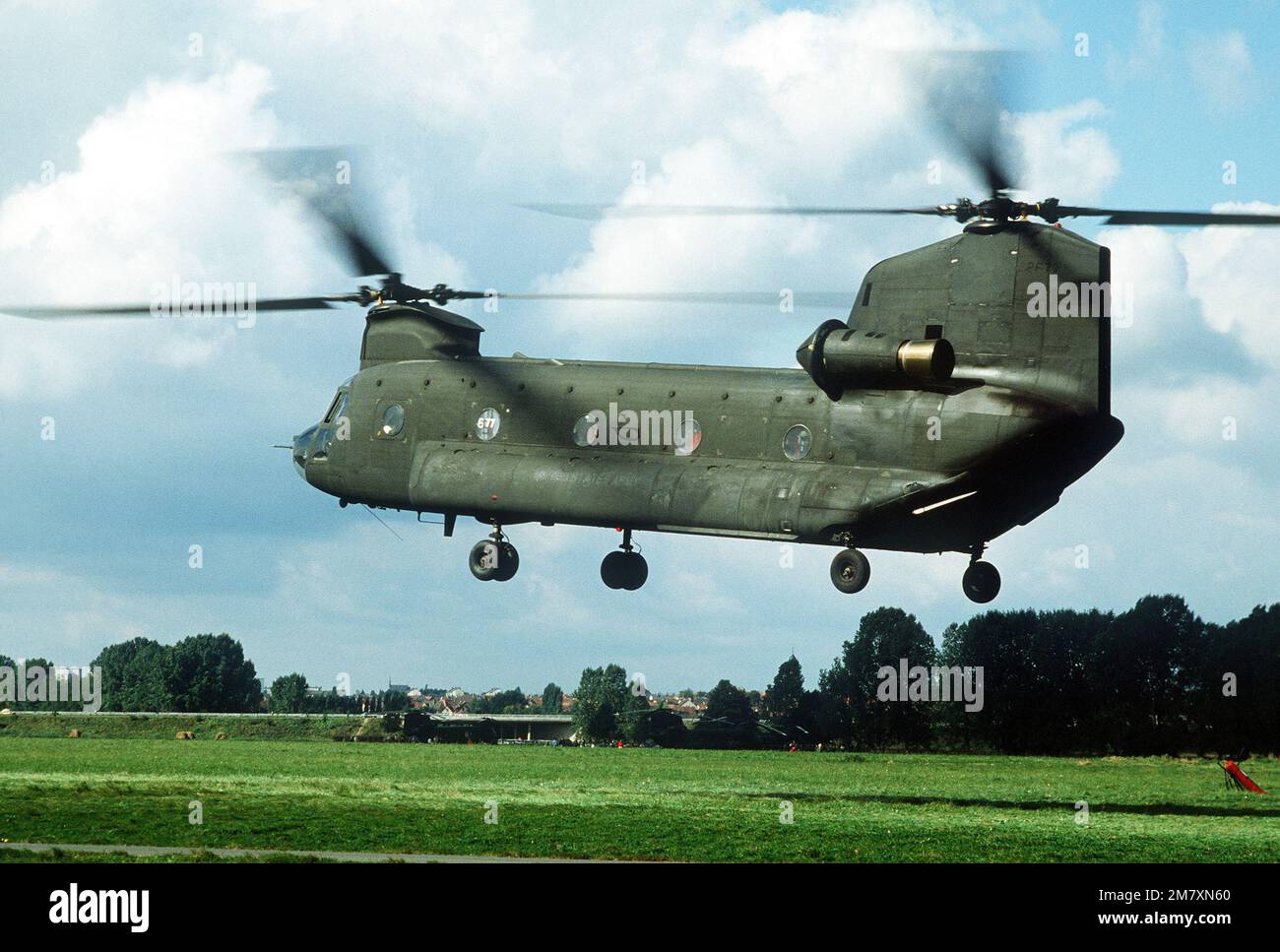 A left side view of a CH-47 Chinook helicopter upon landing during ...