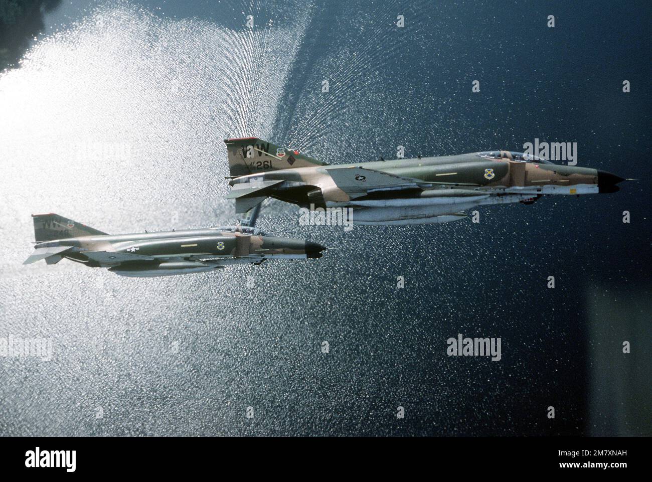 A right side view of two F-4 Phantom II aircraft from the 563rd ...