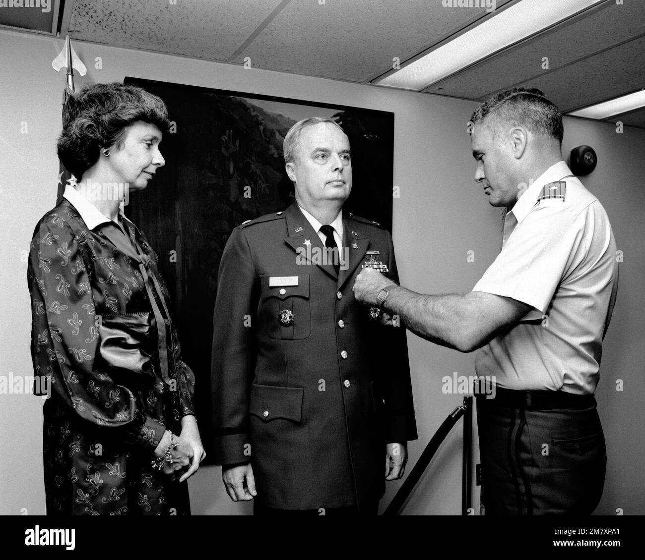 The Legion of Merit is presented to LCOL Walter D. Marshall by BGEN ...