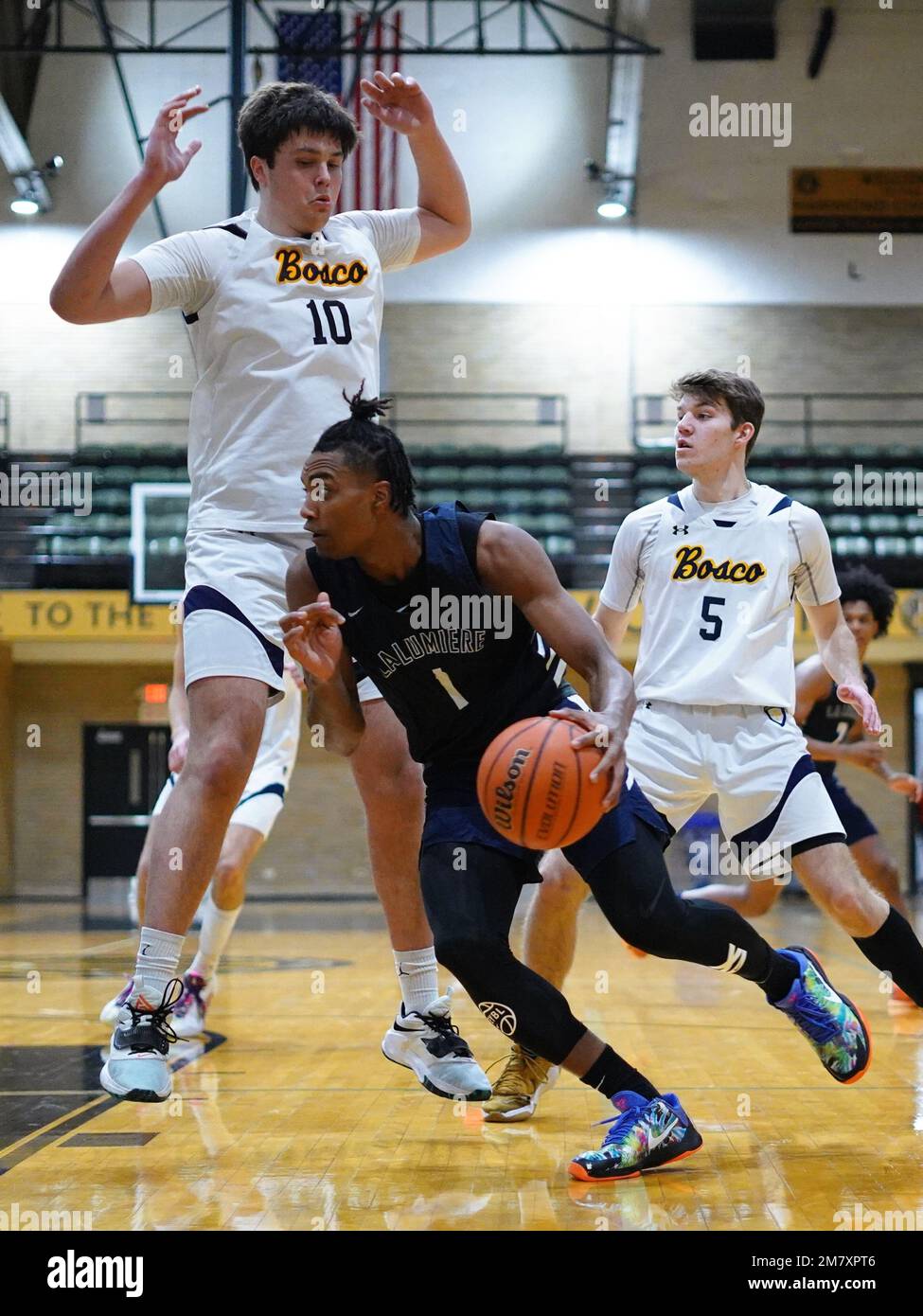 An Indiana High School basketball tournament, players in white ...