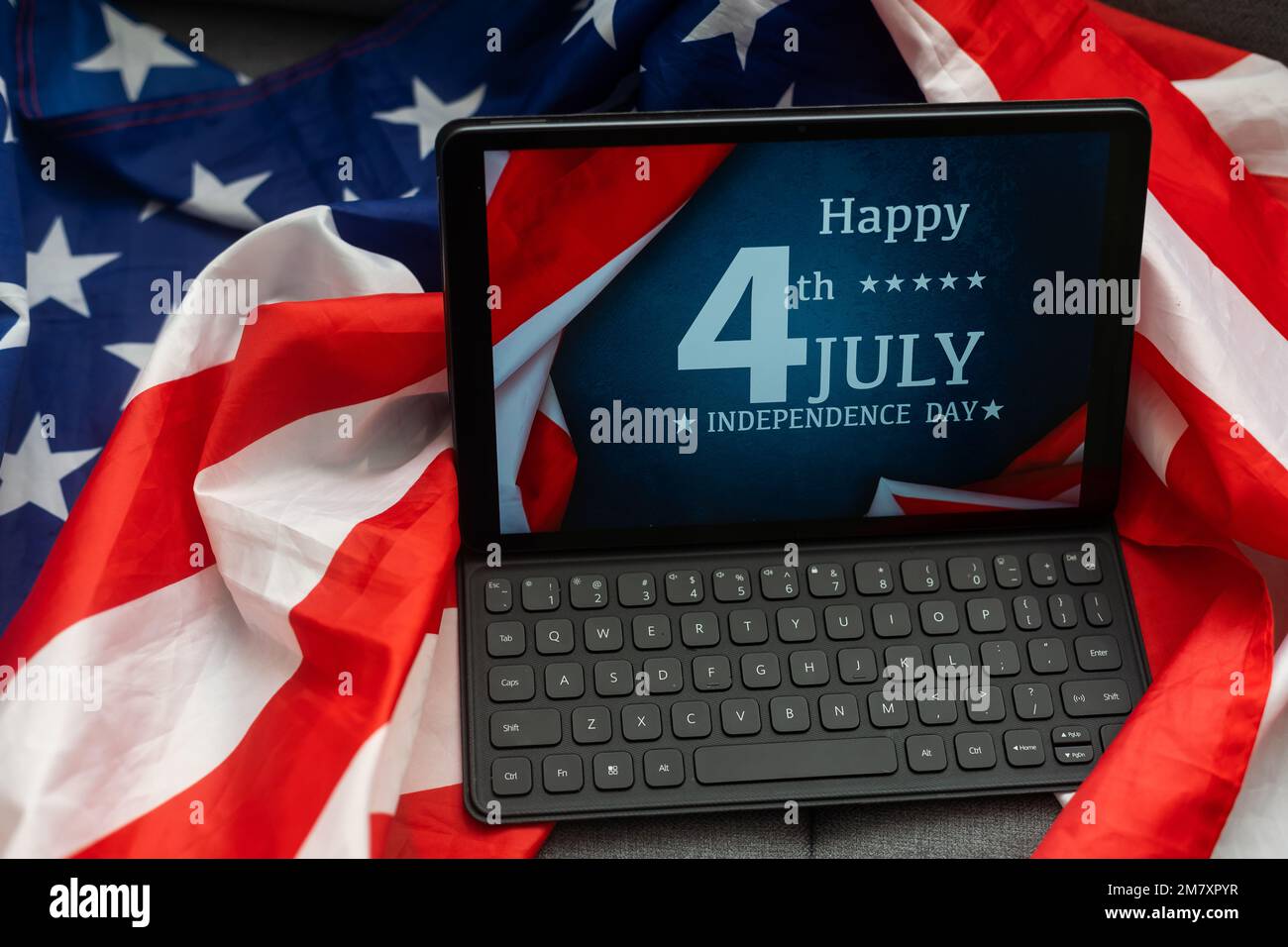 american flag and digital tablet on table Stock Photo - Alamy