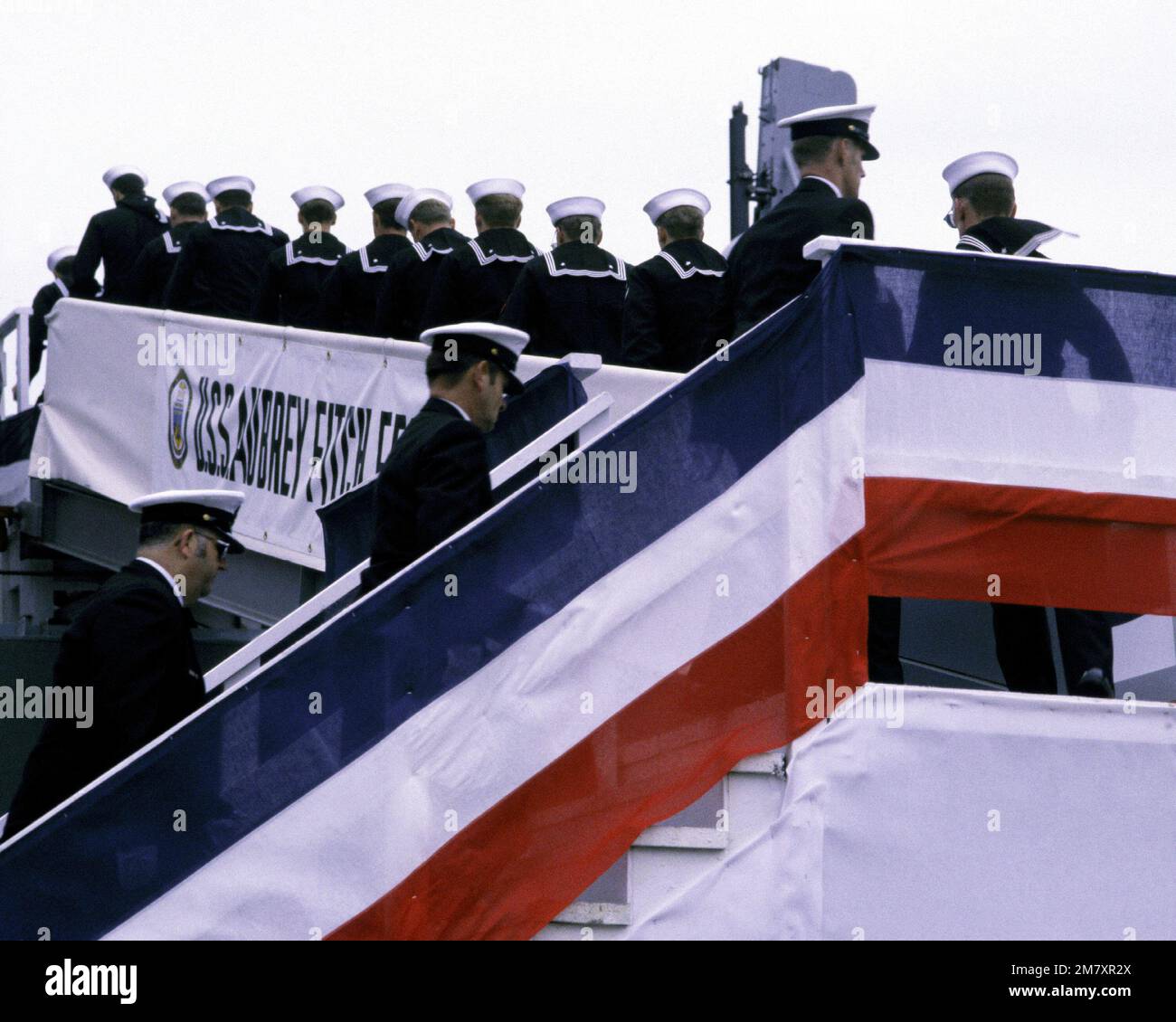 Crewmen go aboard the guided missile frigate USS AUBREY FITCH (FFG-34 ...