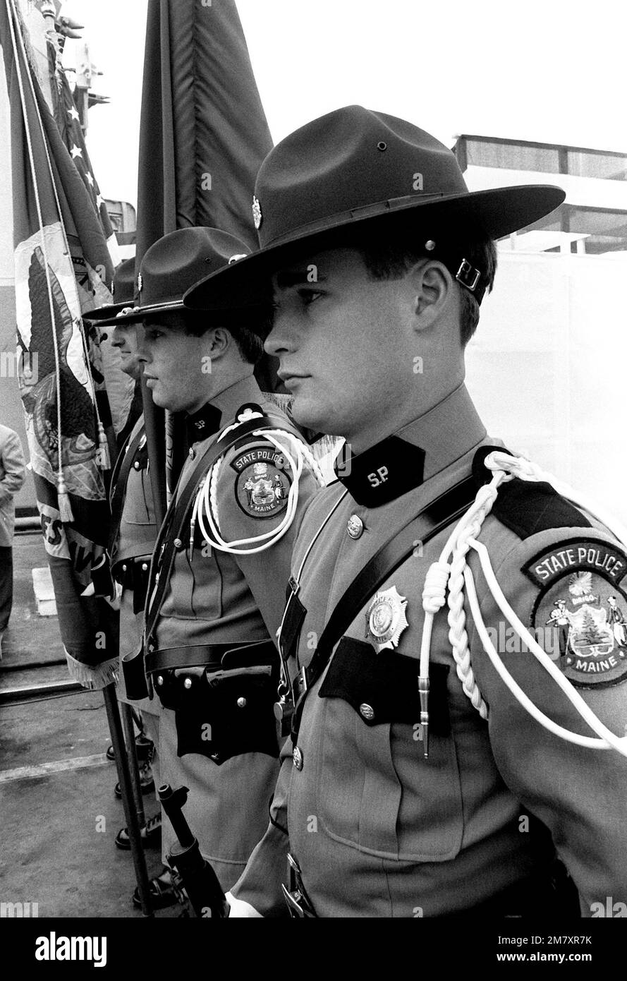 Side view of a color guard consisting of five Maine State Troopers as ...