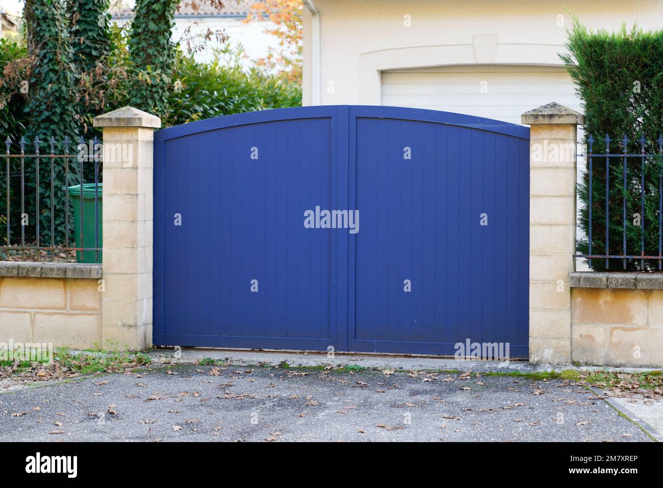 Blue metal gate entrance hi-res stock photography and images - Alamy