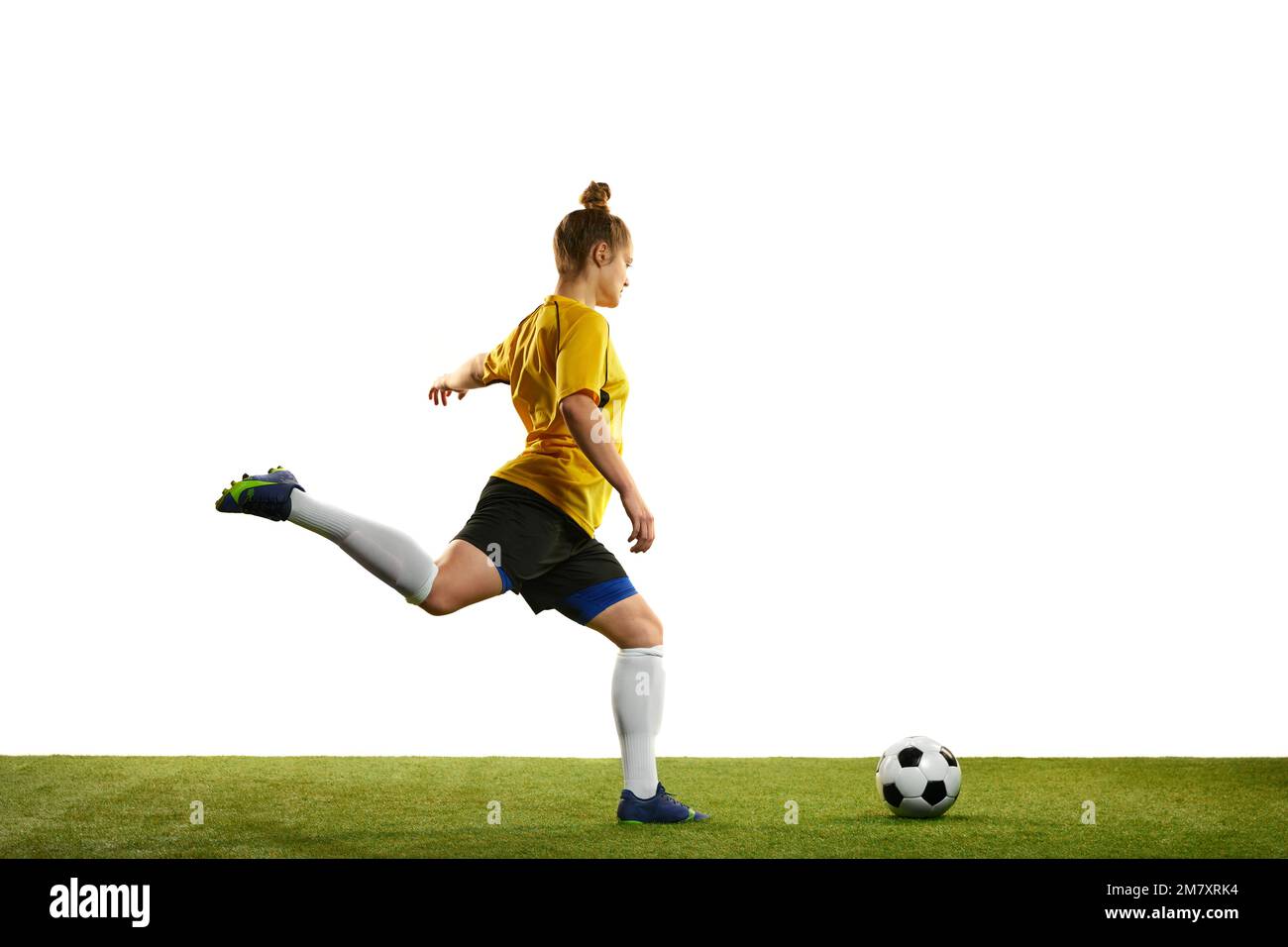 Winning goal. Young professional female football player in motion ...