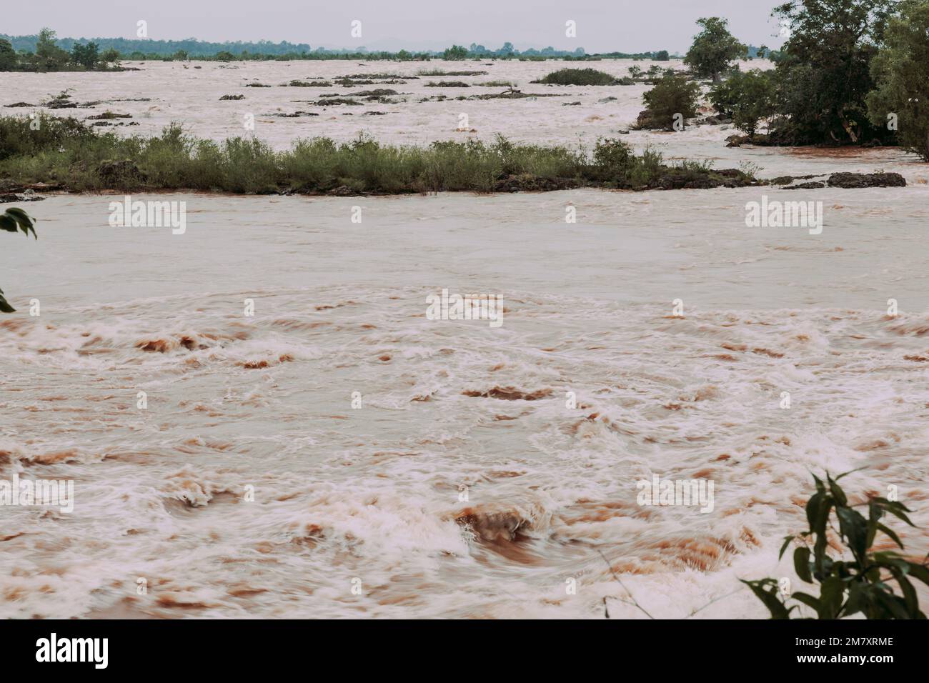 Overflow of a river in Laos Stock Photo - Alamy