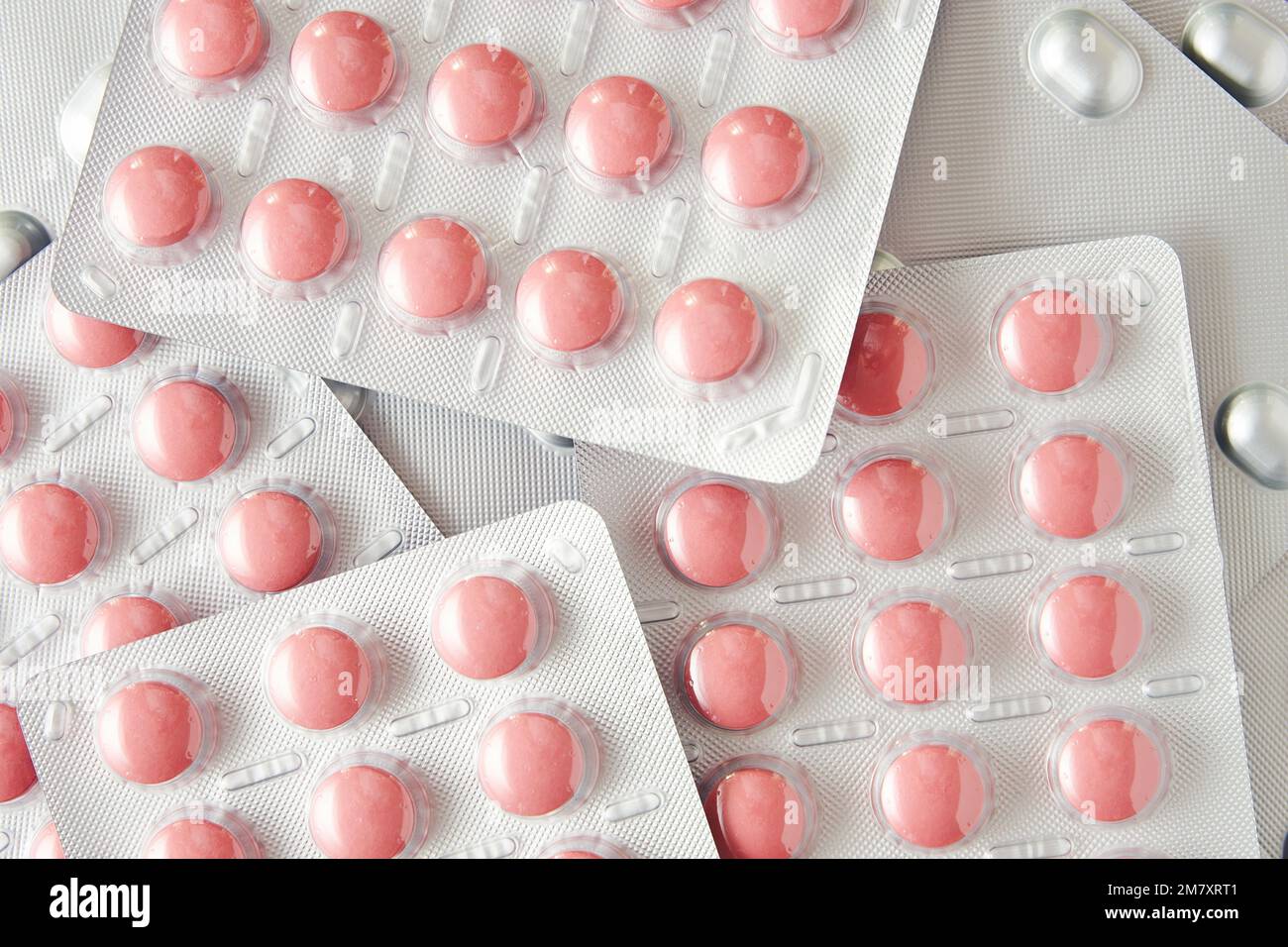 Texture of medical pills and tablets packages, top view. Heap of ...