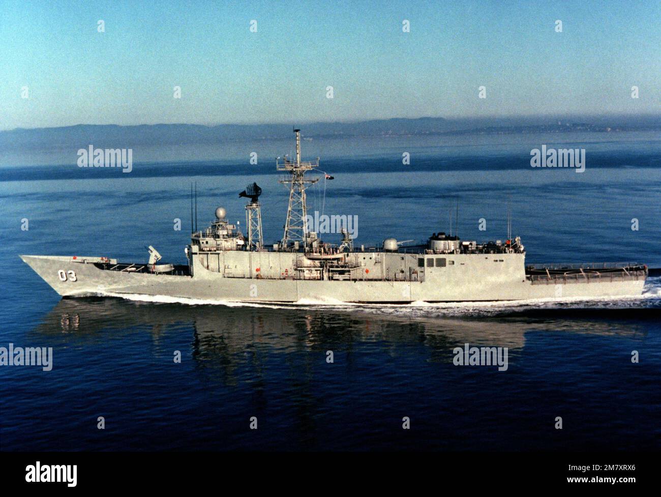 Aerial port beam view of the Australian frigate SYDNEY (F-03) underway ...