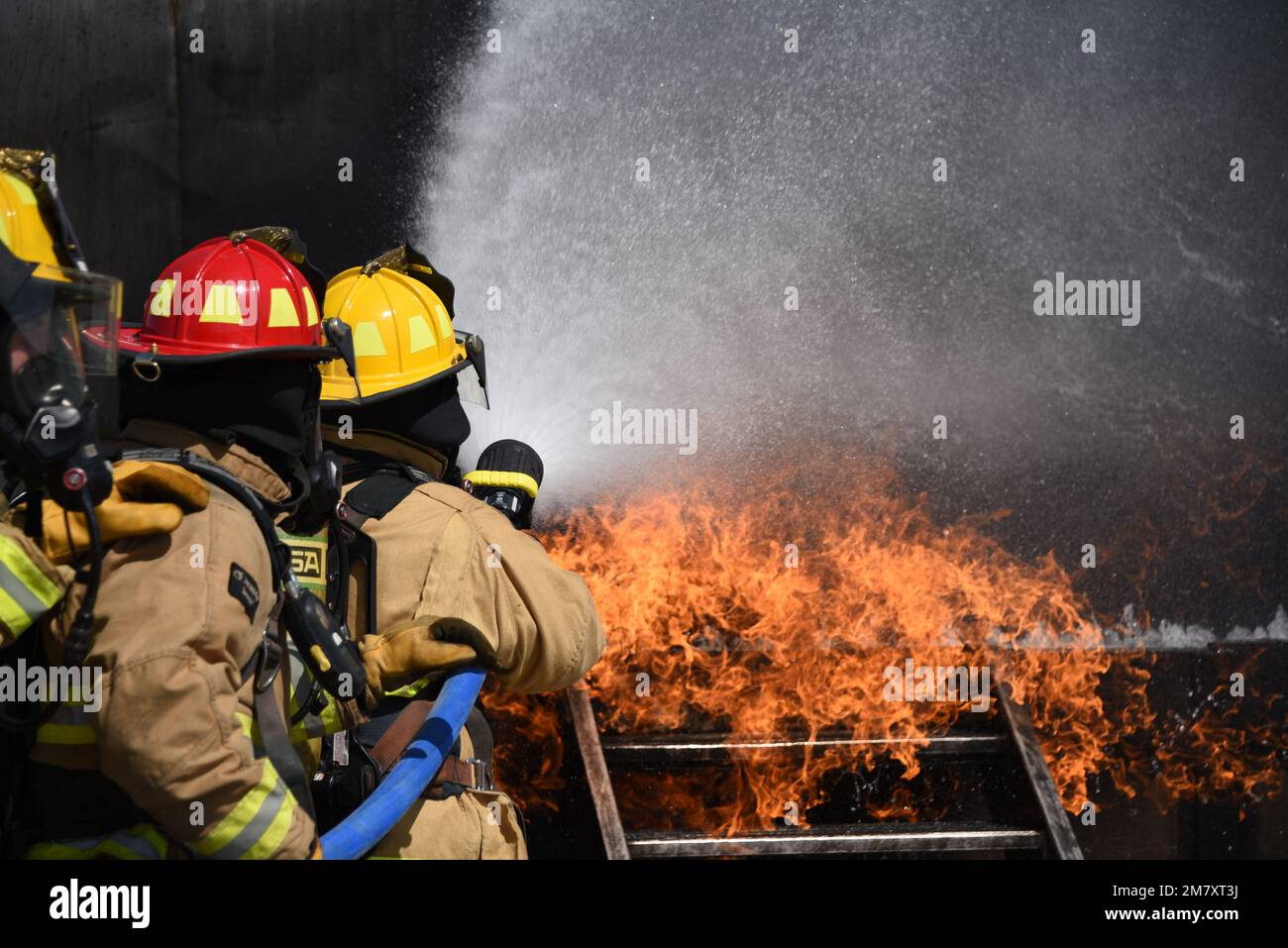 Fire Fighters assigned to the 185th Air Refueling Wing extinguish a ...
