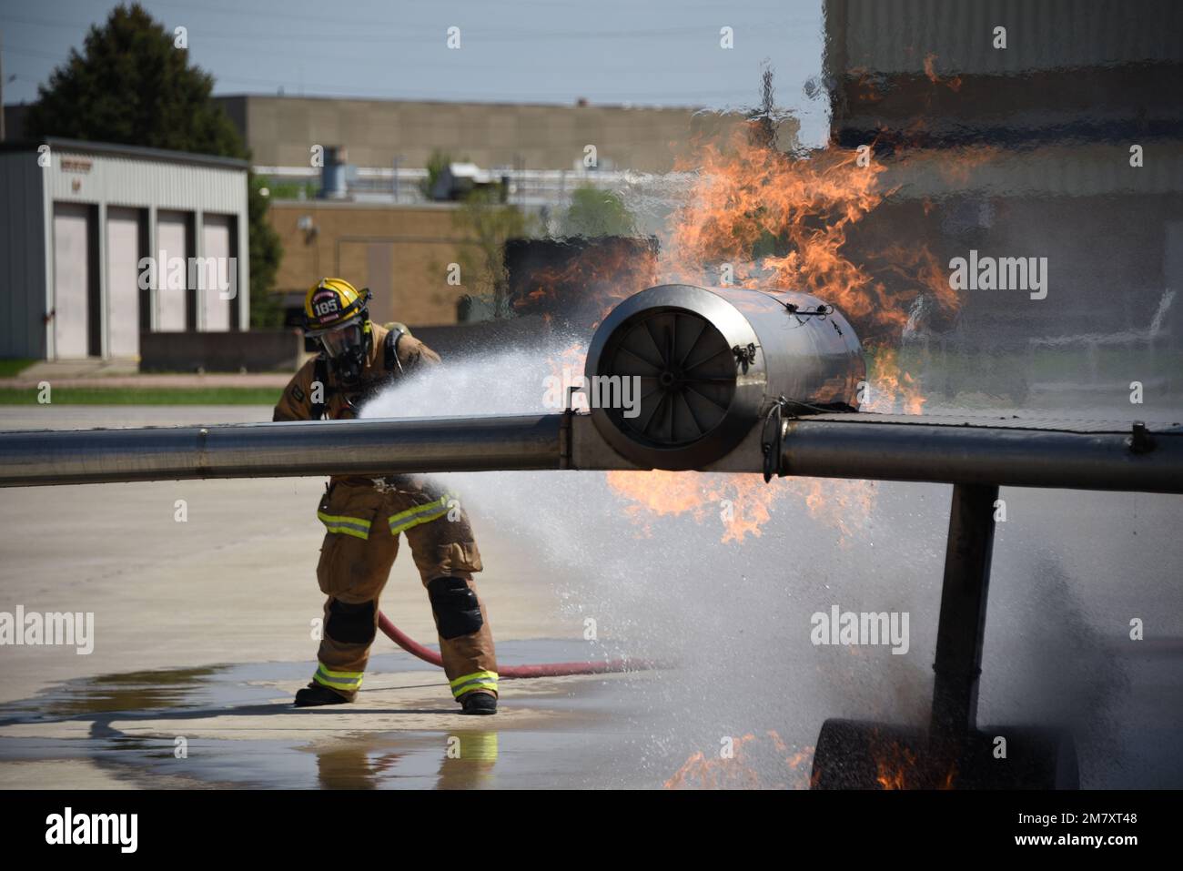 Fire Fighters assigned to the 185th Air Refueling Wing extinguish a ...