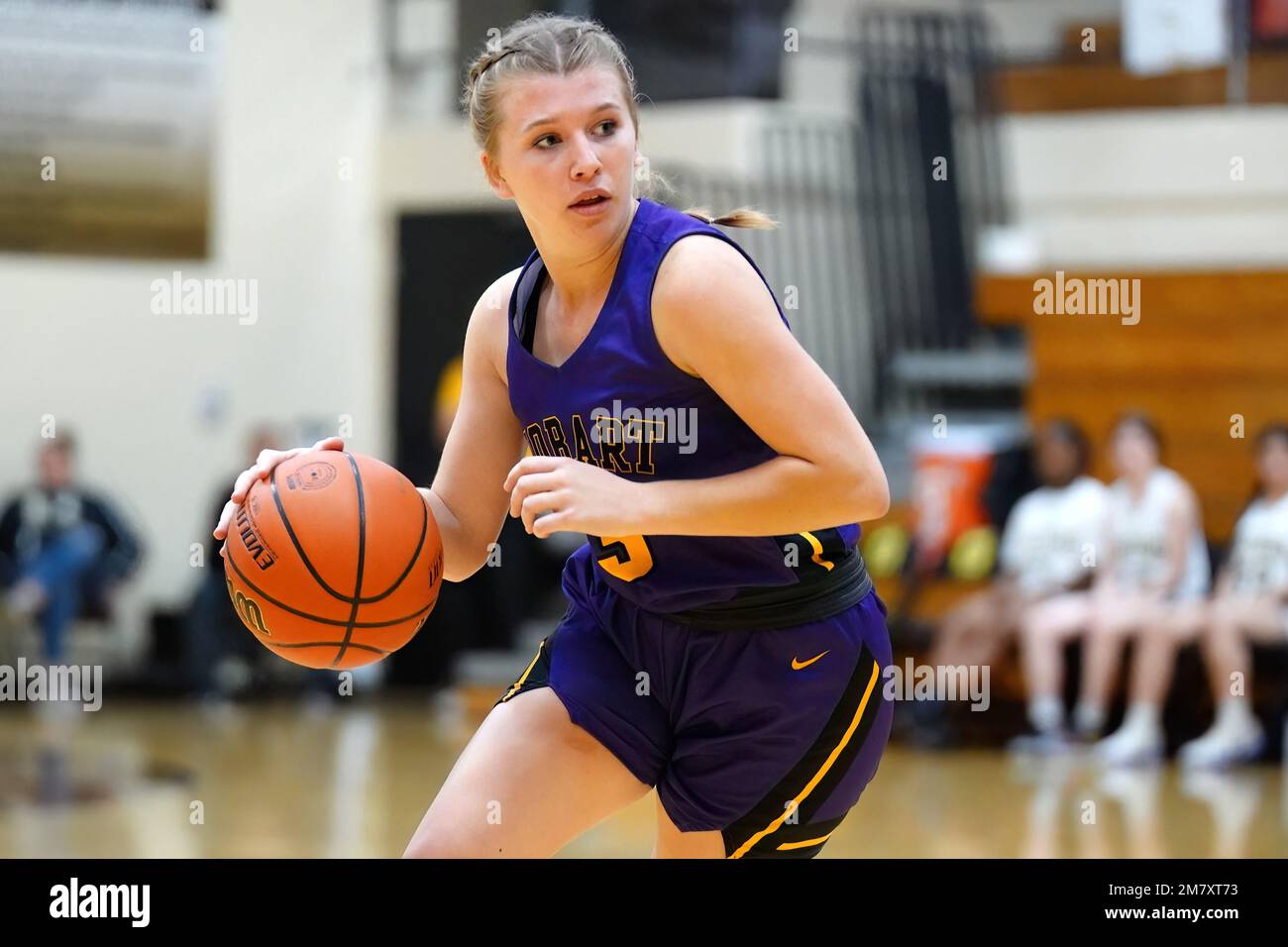 A girl playing basketball during the girls fall high school tournament ...