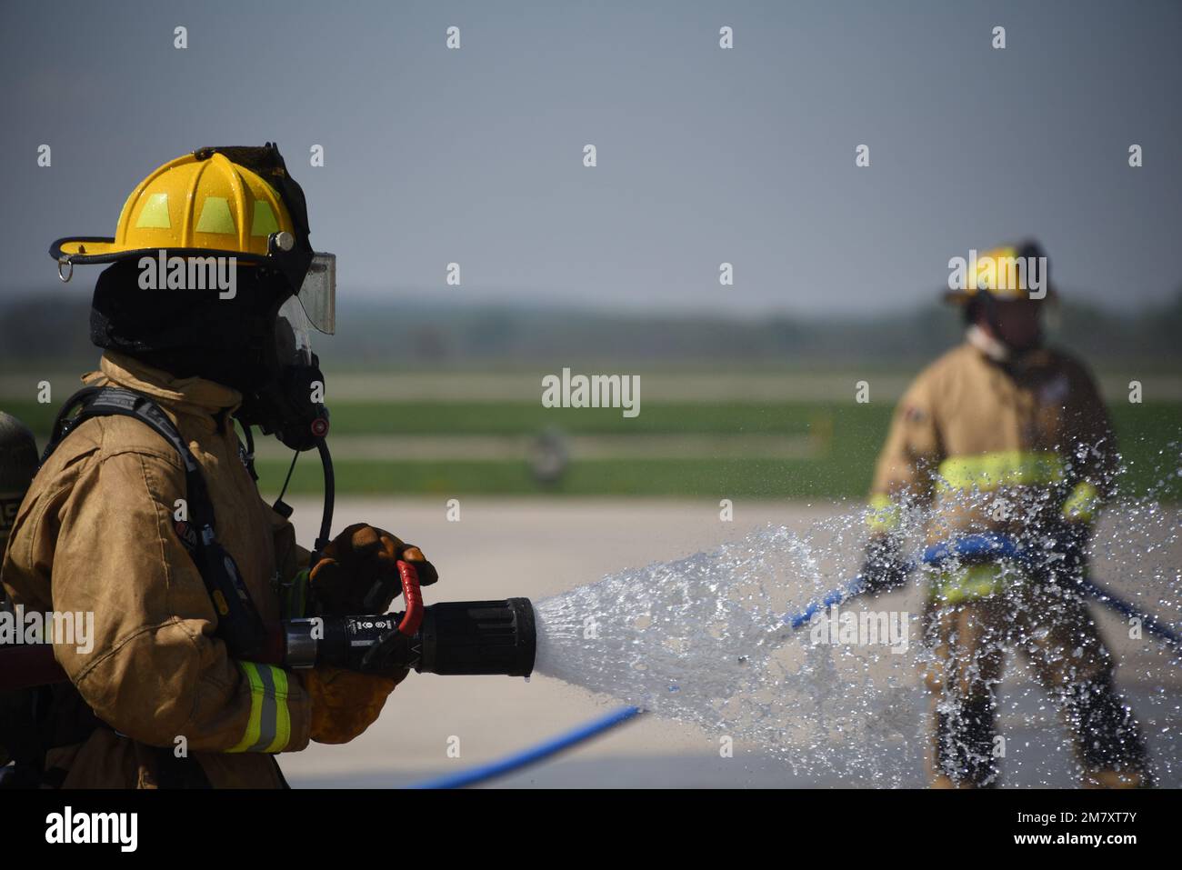 Fire Fighters assigned to the 185th Air Refueling Wing extinguish a ...