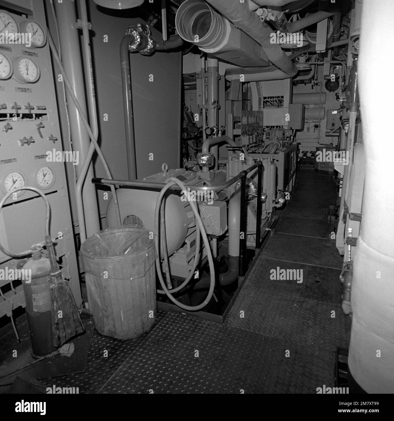 The lower level engine room aboard the guided missile frigate DOYLE ...