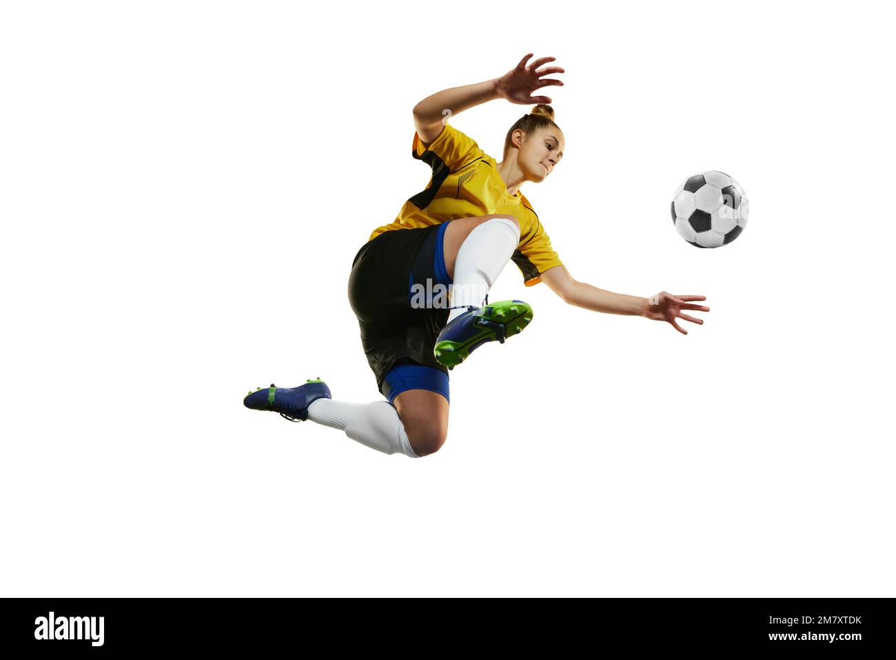 Bottom view. Young woman, professional female football, soccer player ...