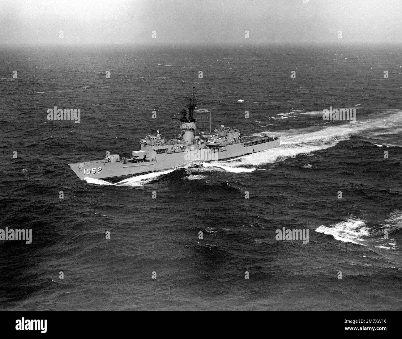 Aerial port bow view of the guided missile frigate USS KNOX (FF 1052 ...