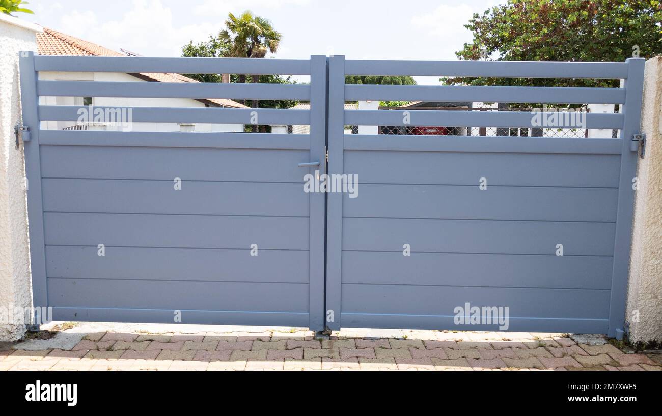Aluminum grey steel gray metal gate of modern suburb house entrance ...