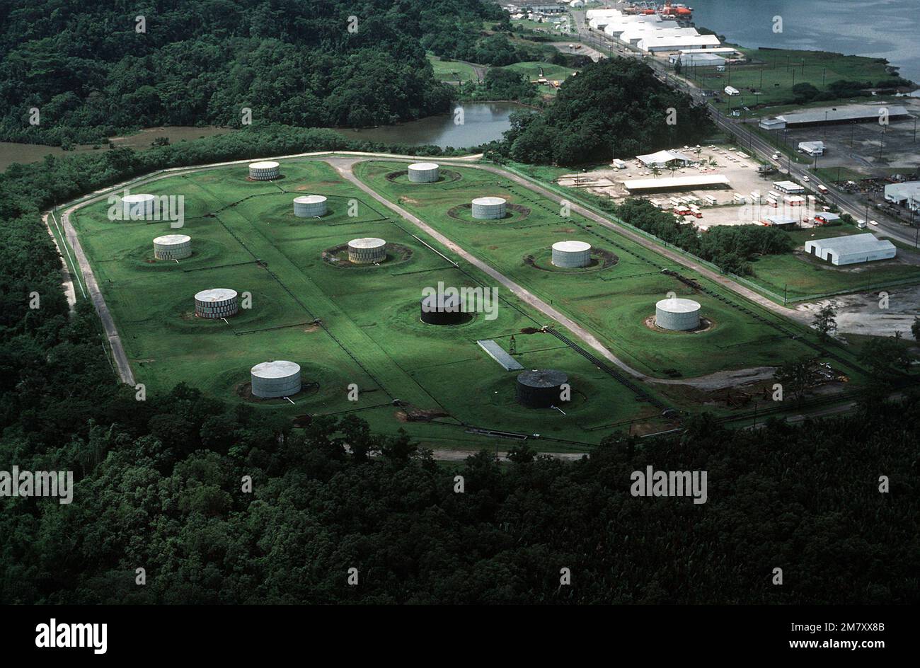 Aerial view of the fuel farm and bus and taxi complexes (right). Base ...