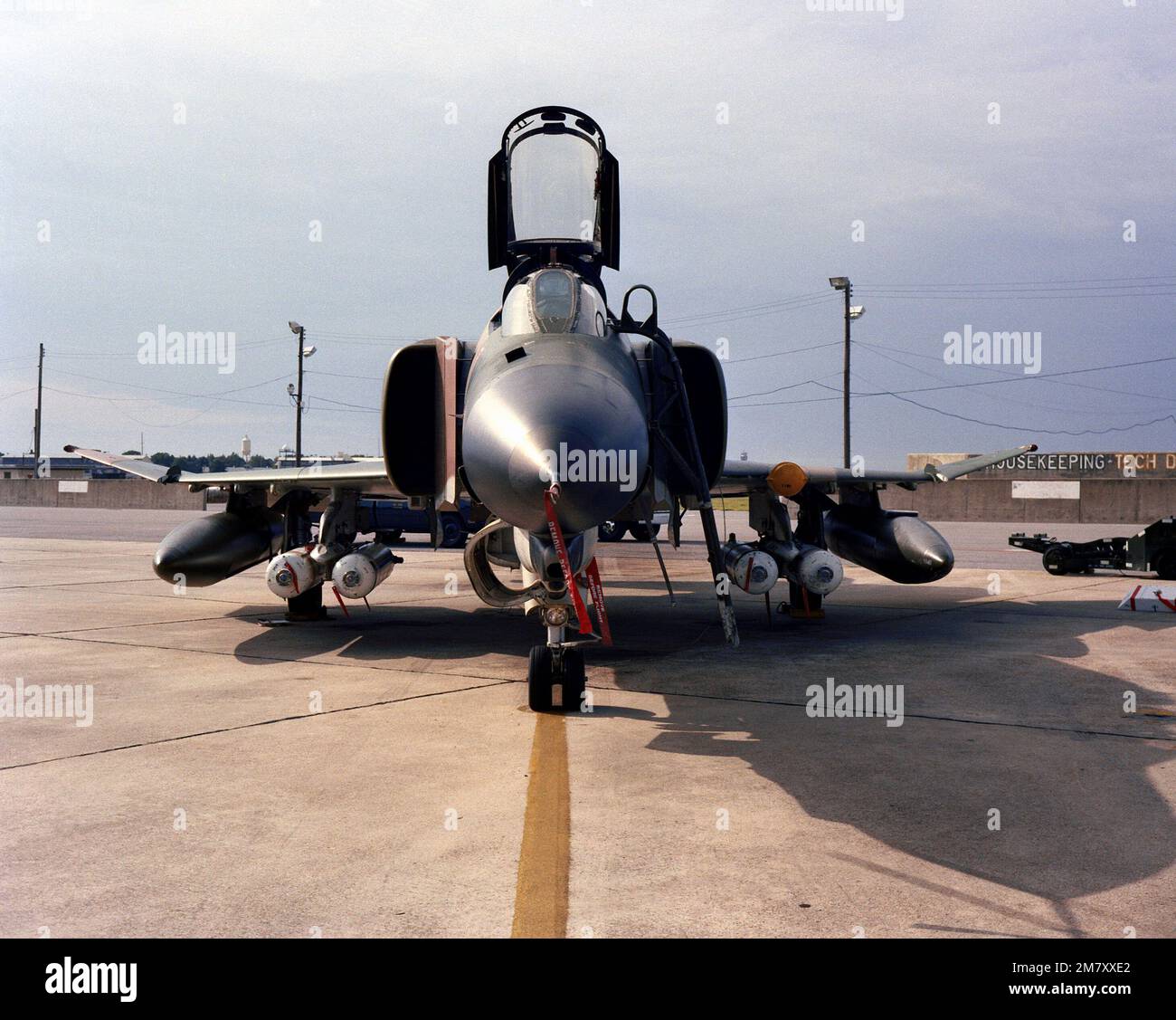 A front view of an F-4 Phantom II aircraft on the flight line during ...
