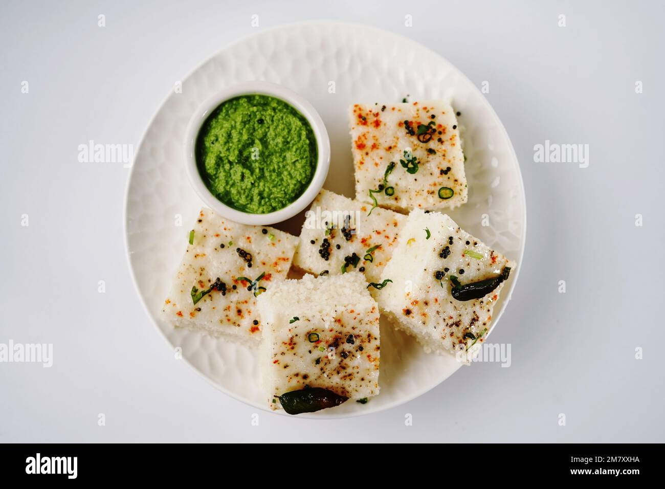 Spongy white dhokla - popular Gujarati steamed breakfast with rice or ...