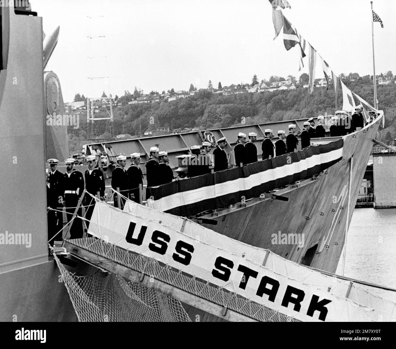 The crewmen line the rail during the commissioning ceremony for the ...