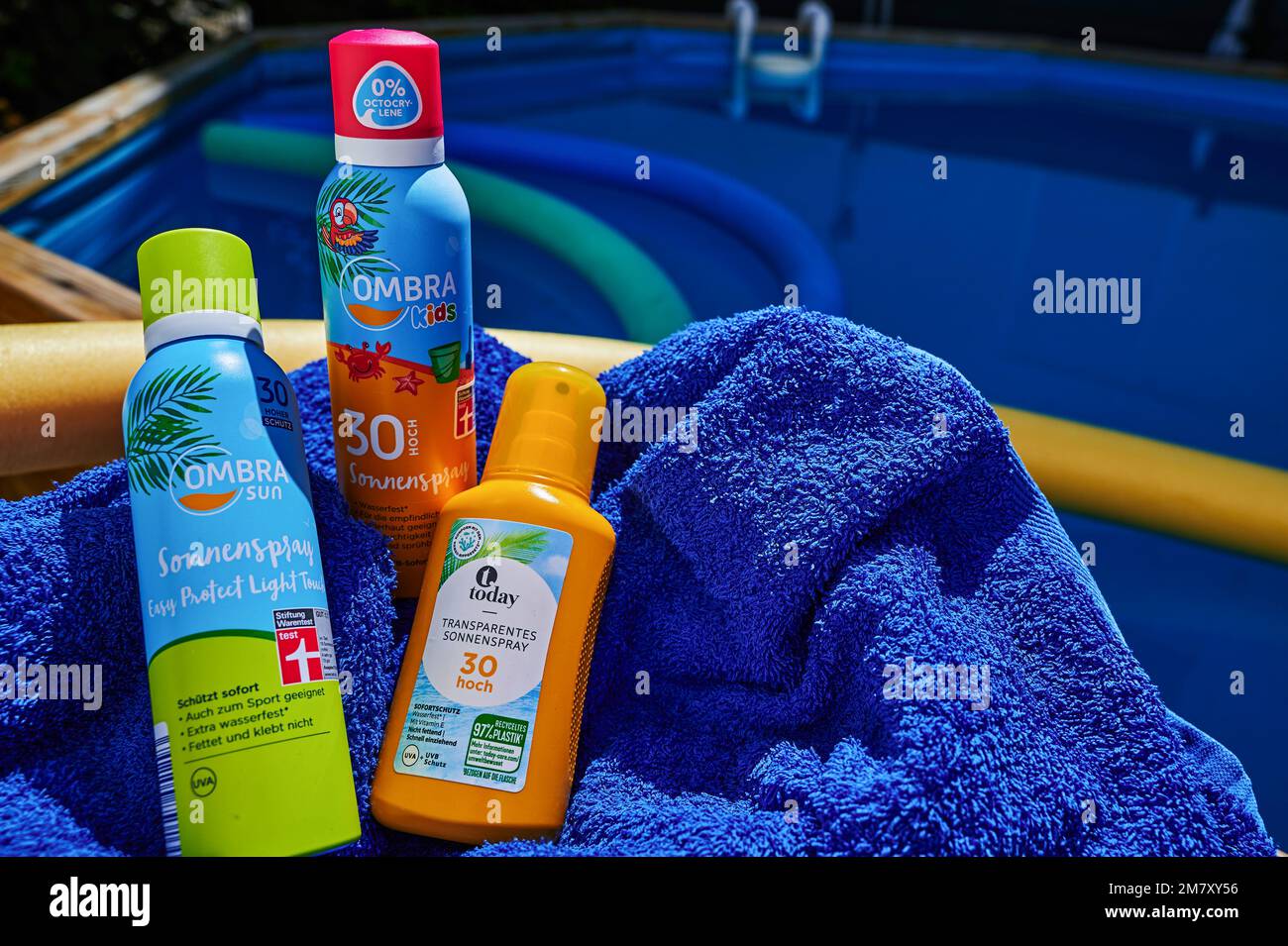 Berlin, Germany - July 24, 2022: Anti-sunburn spray on a blue towel by ...