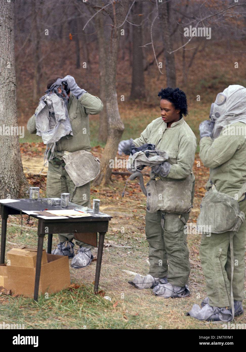 Soldiers practice decontamination procedures on their chemical warfare ...