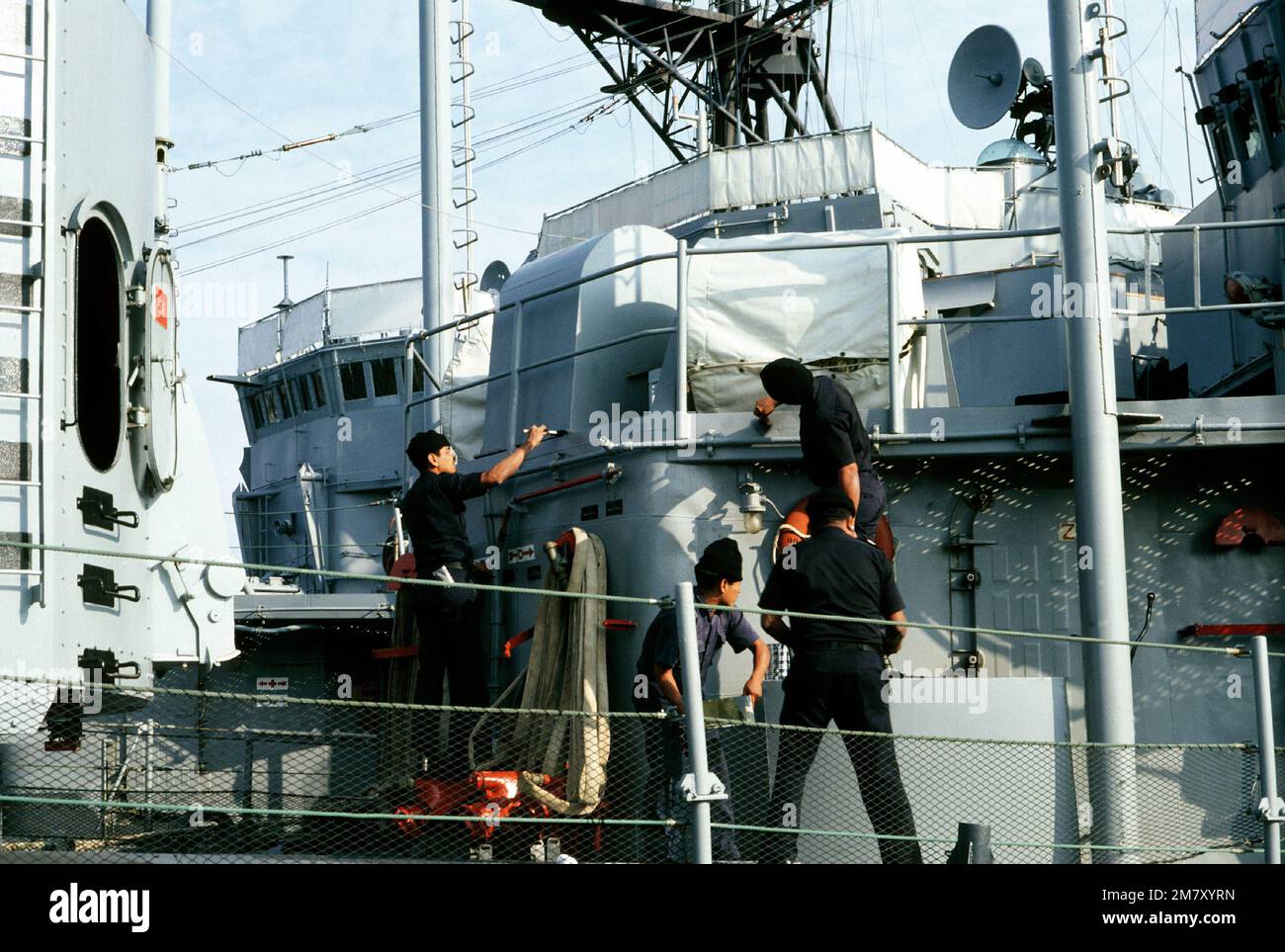 Mexican sailors perform topside maintenance aboard the QUETZALCOATL ...