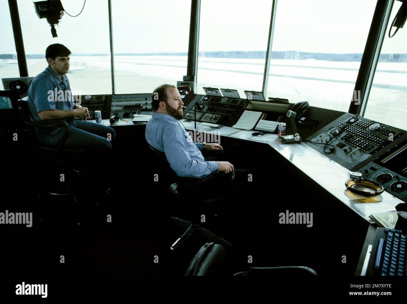 Flight operations take place in the base control tower. Base: Naval Air ...